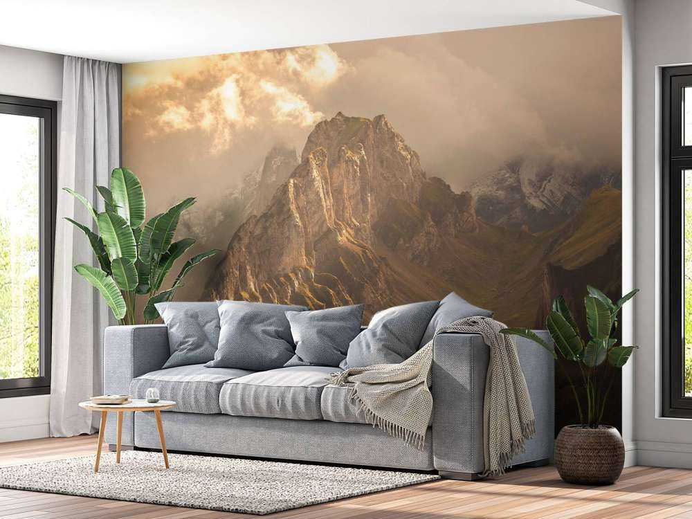 Fotobehang - Gouden zonlicht op grillige bergkam - Fotobehang