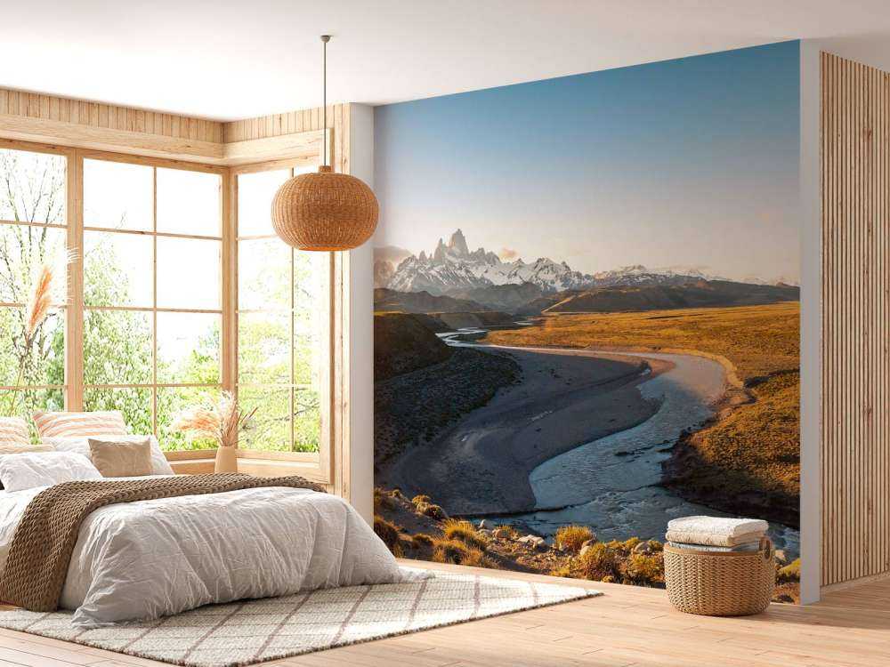 Fotobehang - Berglandschap met kronkelende rivier in ochtendlicht ...